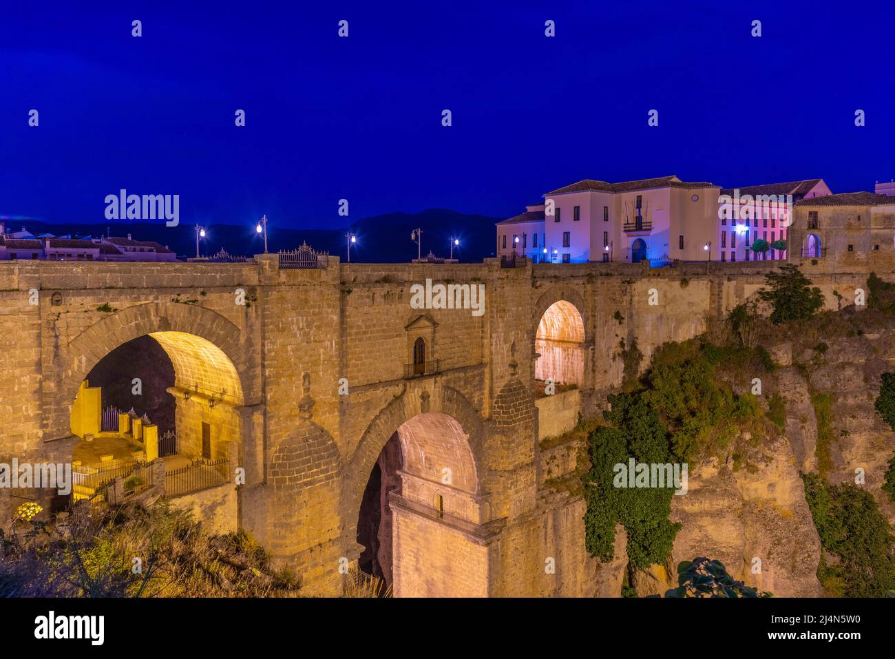 Sunset view of Puente nuevo bridge in Spanish town Ronda Stock Photo ...