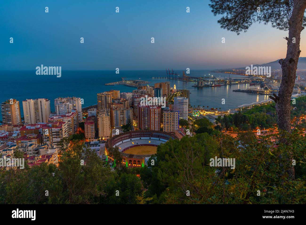 Sunset aerial view of the corrida building in the spanish city malaga ...