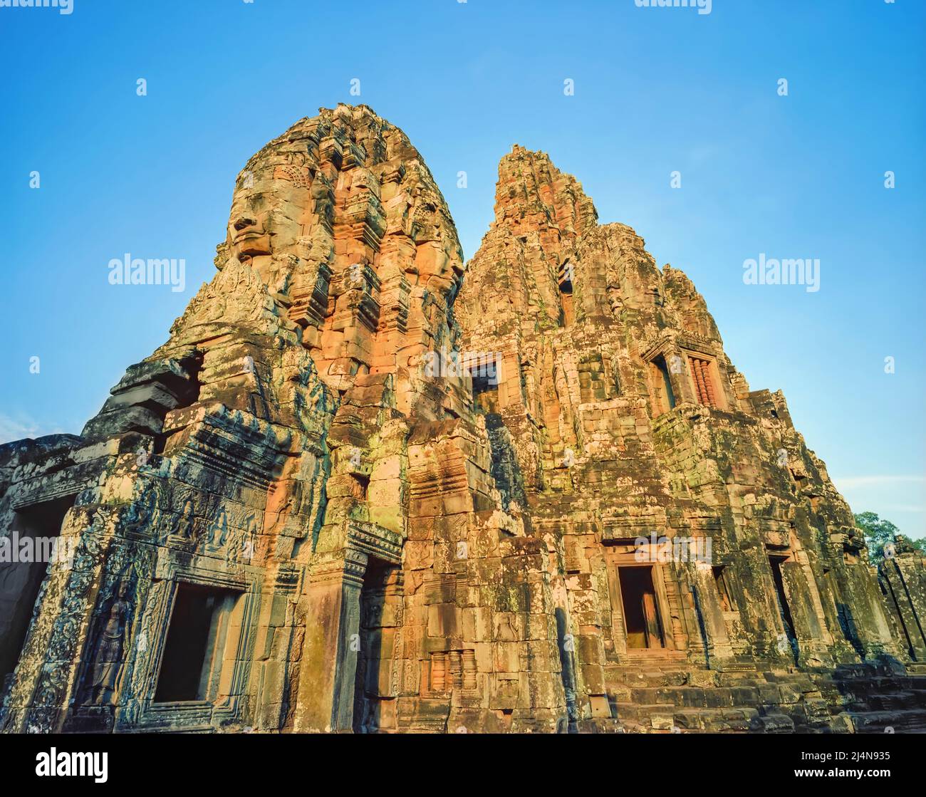 The ancient Bayon ruins at the Angkor Wat temple complex, Cambodia ...