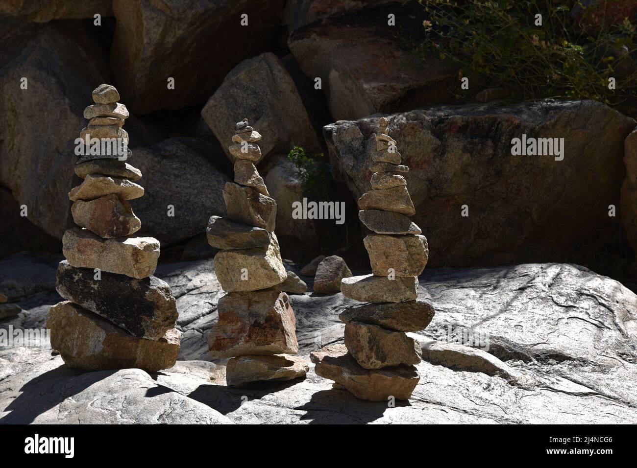 Stacked rocks to mark a trail called stone cairns Stock Photo - Alamy