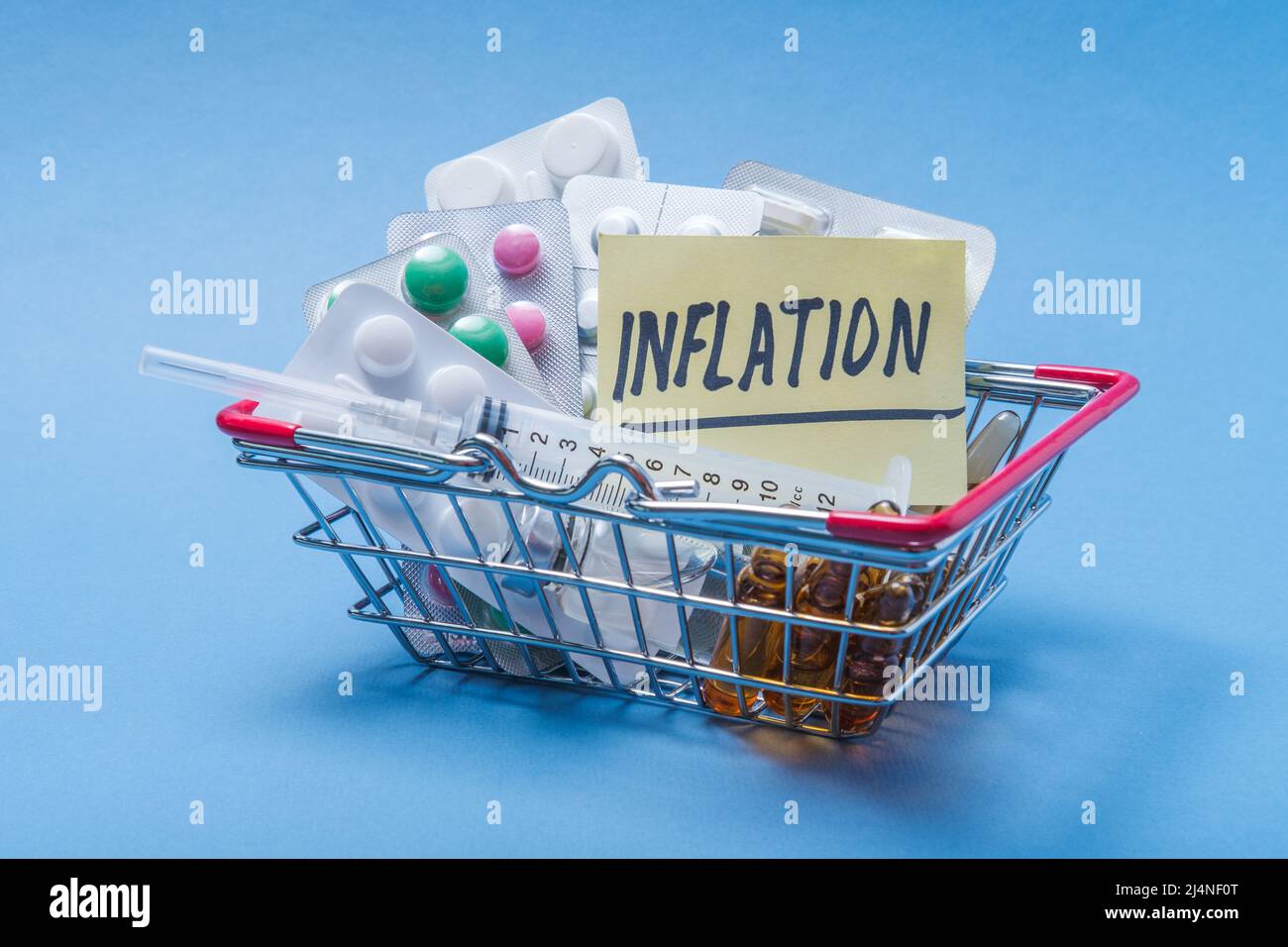 A basket with medical preparations in it on a blue background with ...