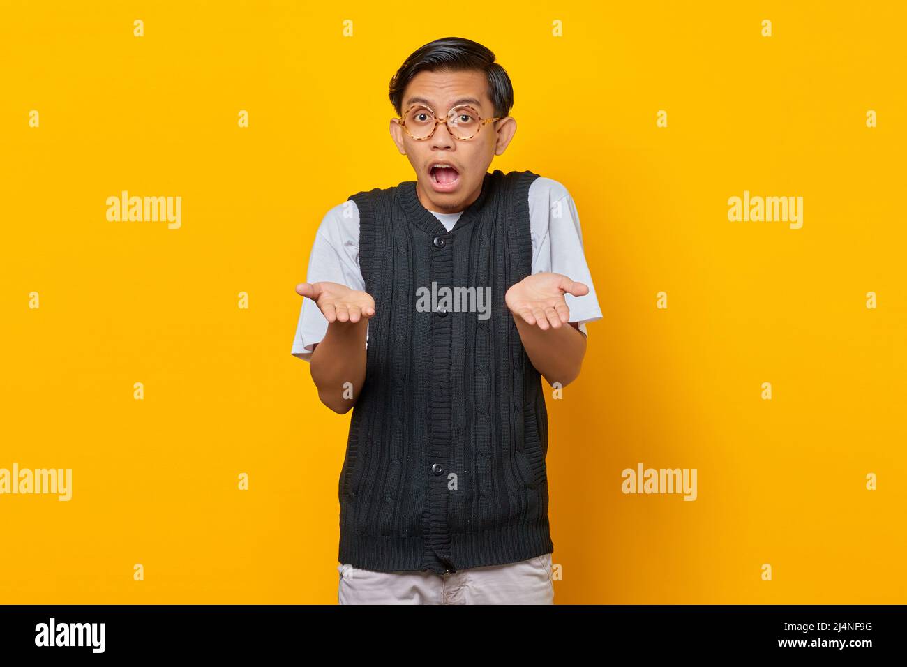 Portrait of asian man surprised with confused and displeased expression ...