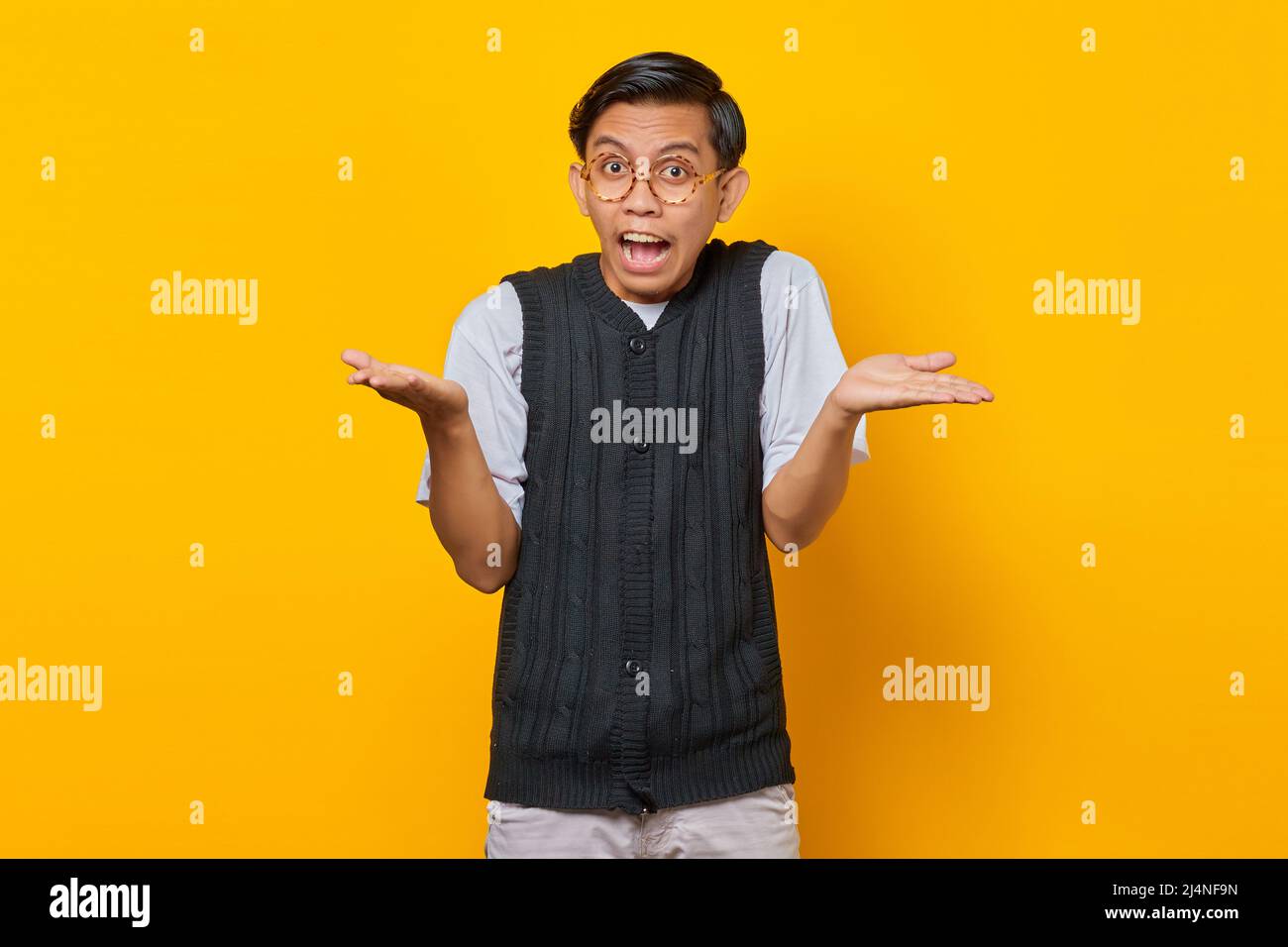 Portrait of asian man surprised with confused and displeased expression ...