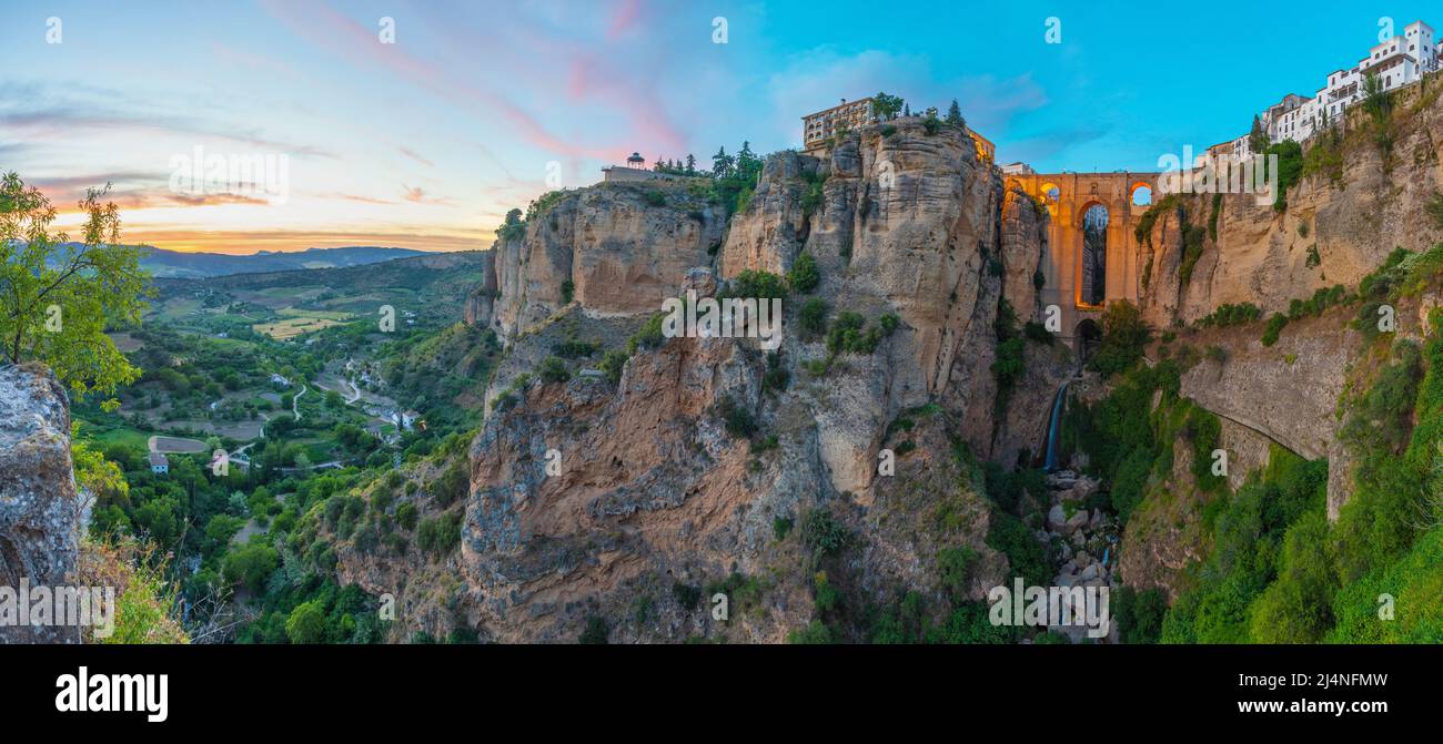 Sunset view of Puente nuevo bridge in Spanish town Ronda Stock Photo ...