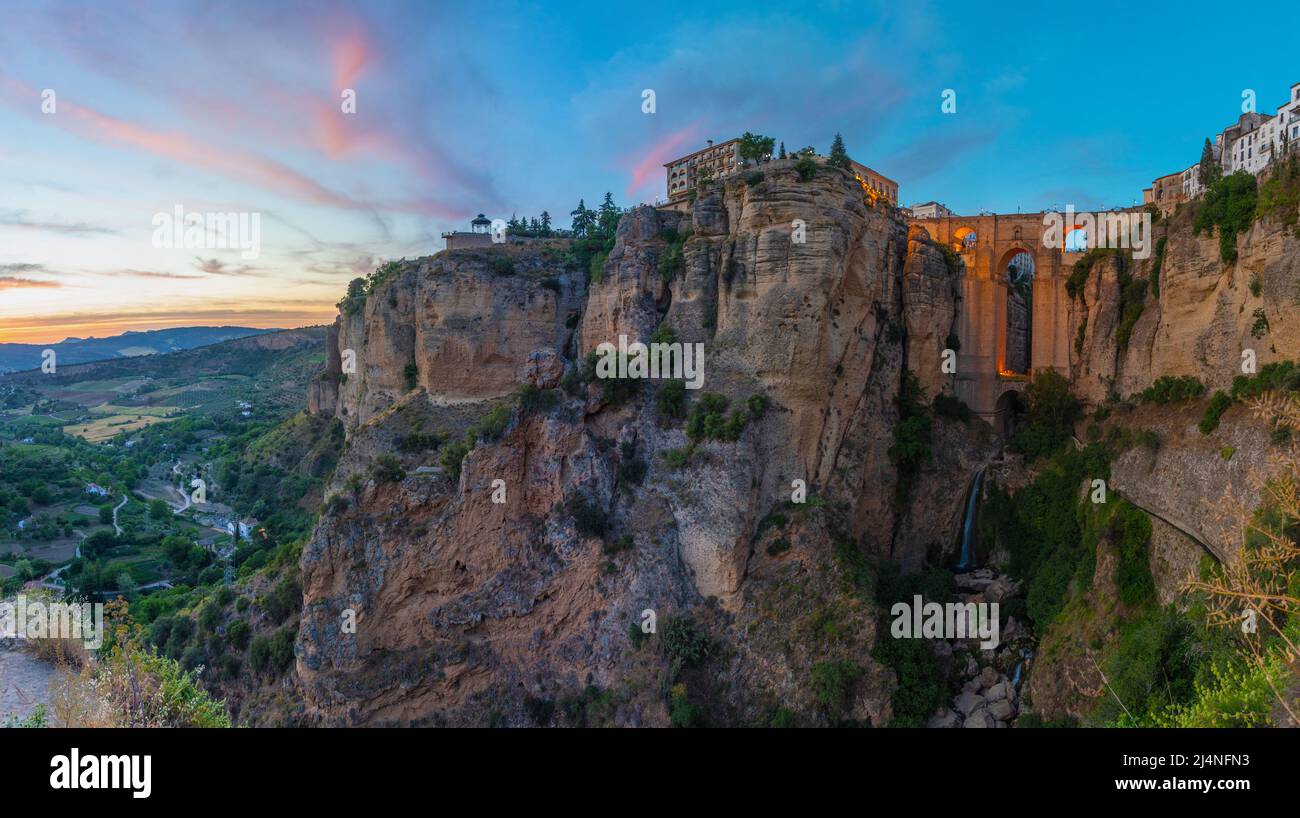 Sunset view of Puente nuevo bridge in Spanish town Ronda Stock Photo ...