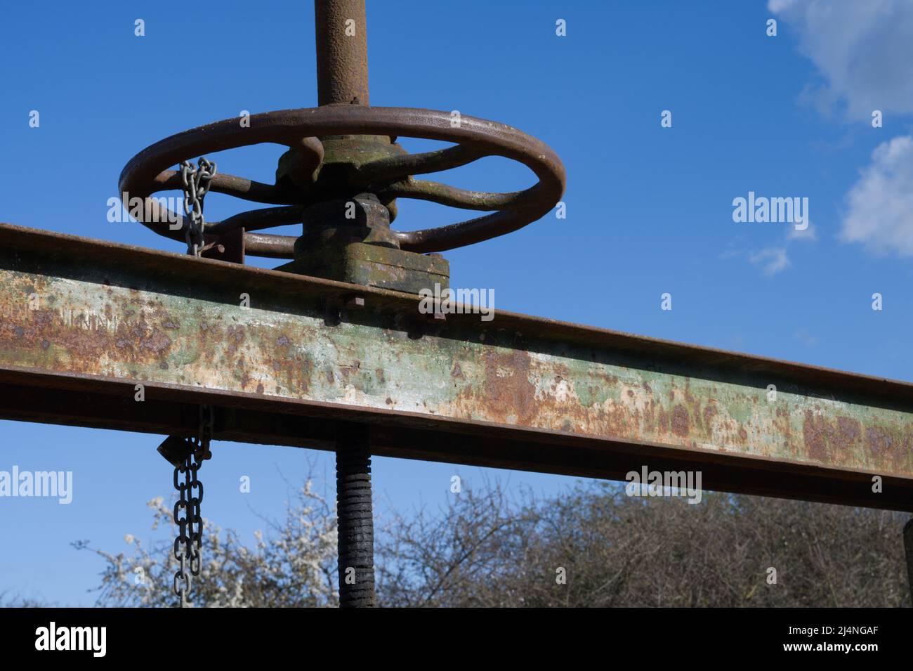 Old, rusty, metal wheel and girder Stock Photo - Alamy