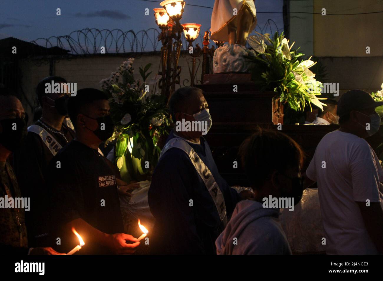 San Jose Del Monte, Philippines. 17th Apr, 2022. Parishioners join the ...