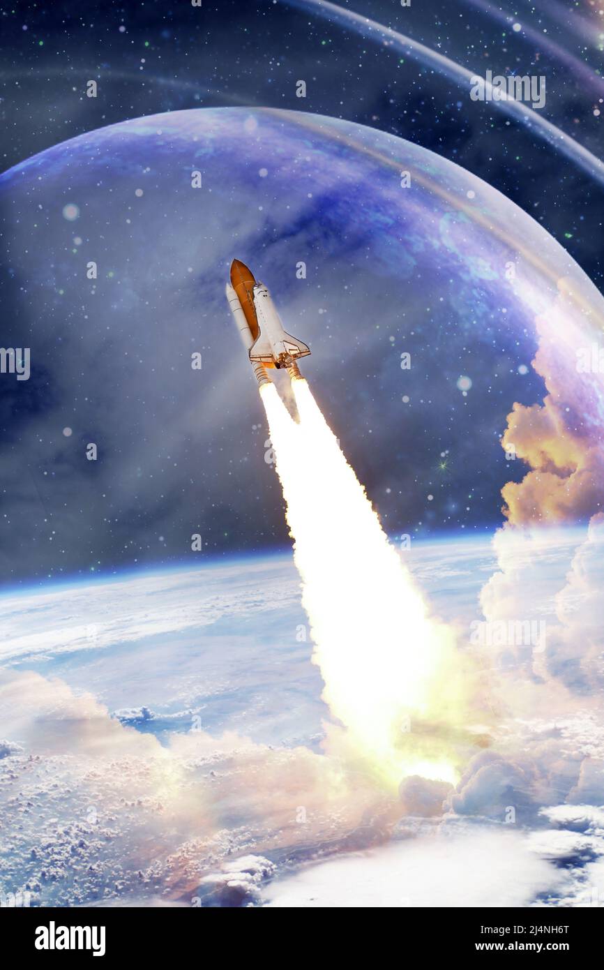 Rockets launch into space on the starry sky. Rocket starts into space ...