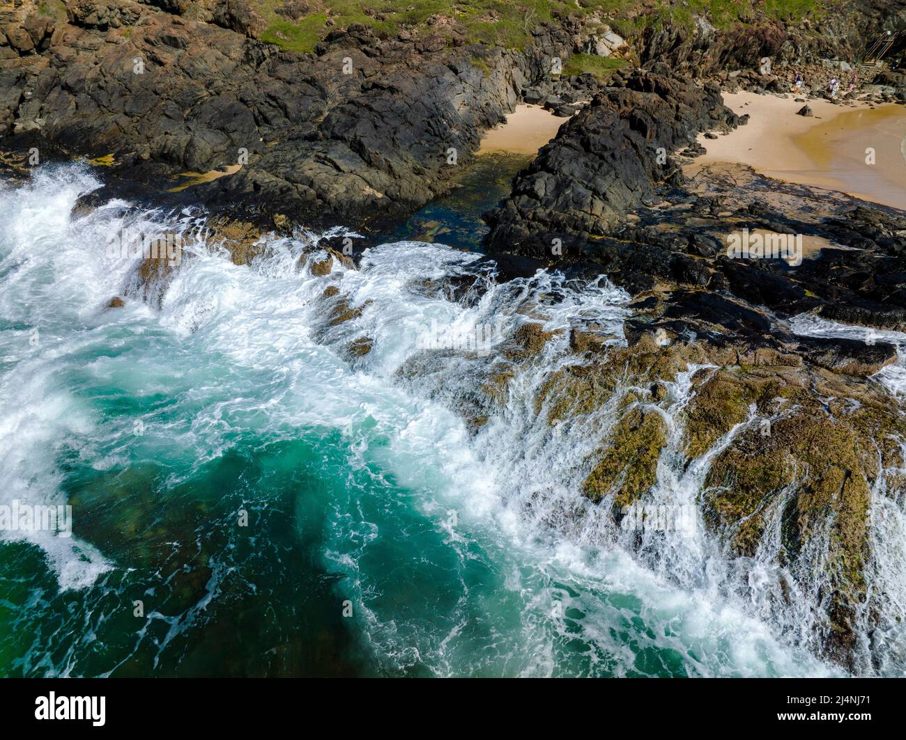 Aerial view of Champagne Pools on the east coast of Fraser Island ...