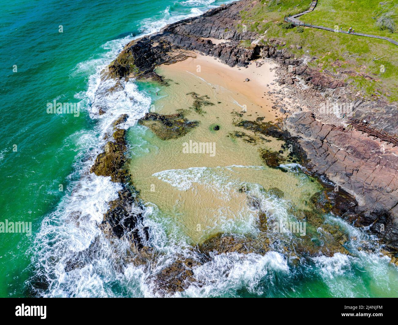 Aerial view of Champagne Pools on the east coast of Fraser Island ...