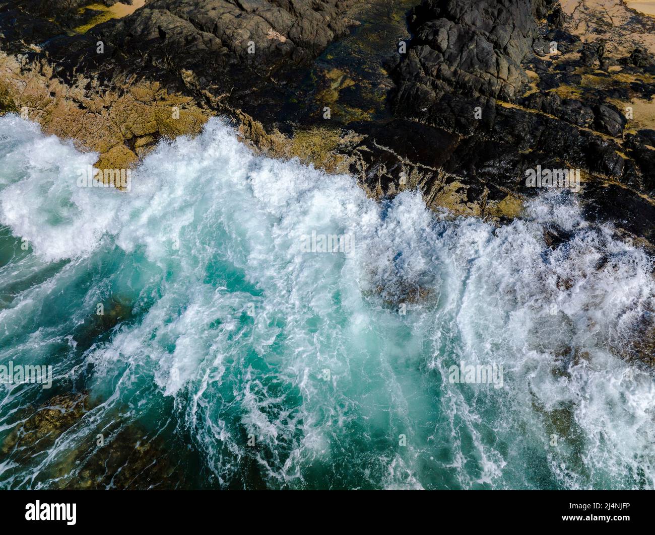 Aerial view of Champagne Pools on the east coast of Fraser Island ...