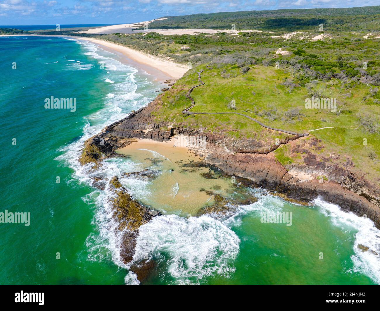 Aerial view of Champagne Pools on the east coast of Fraser Island ...