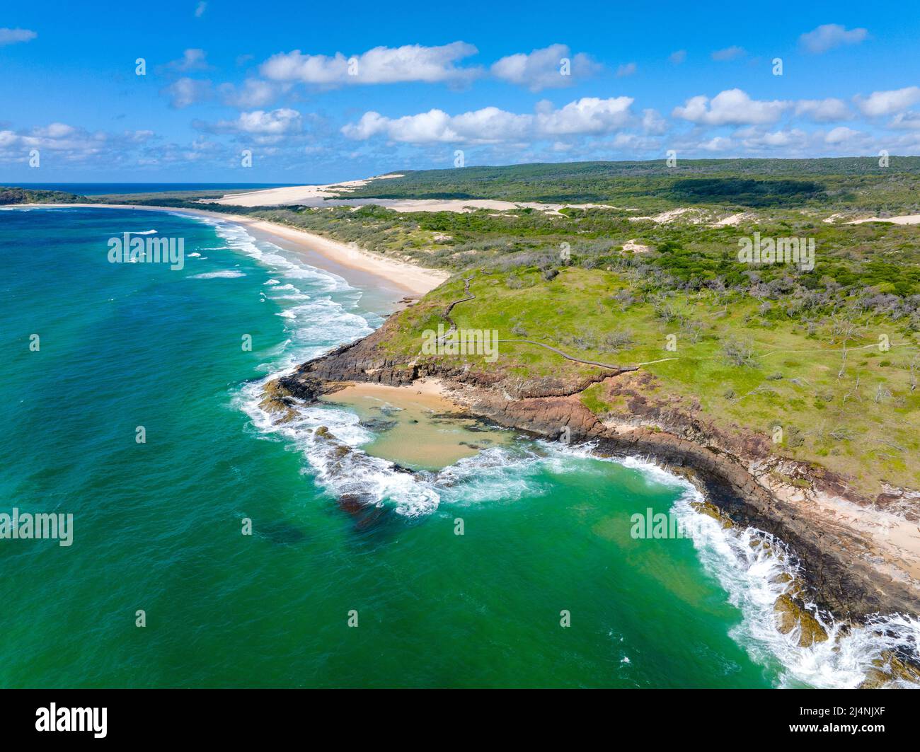 Aerial view of Champagne Pools on the east coast of Fraser Island ...