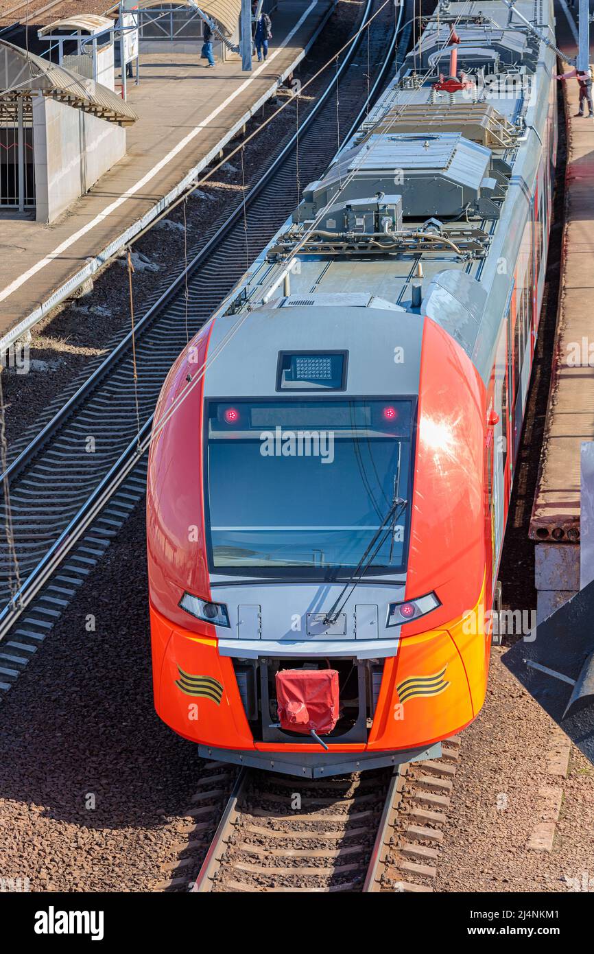 A modern high-speed train stands at the station Stock Photo - Alamy