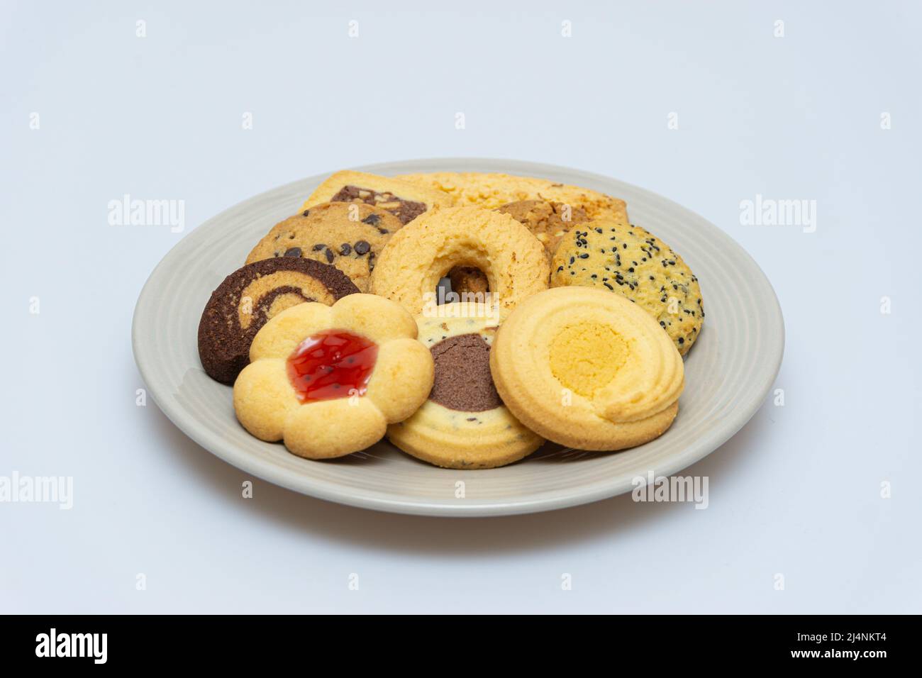 Different types of sweet cookies in bowls Stock Photo - Alamy