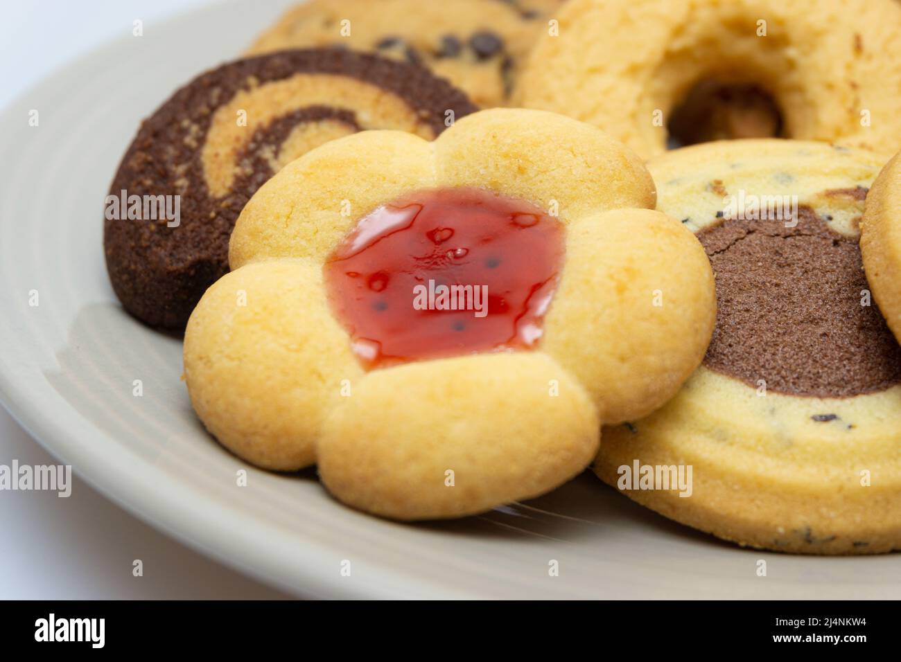 Different types of sweet cookies in bowls Stock Photo - Alamy