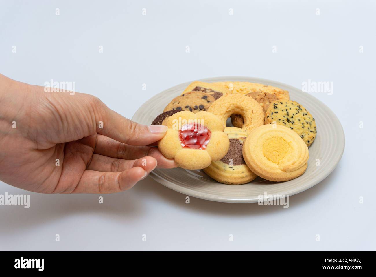 Different types of sweet cookies in bowls Stock Photo - Alamy