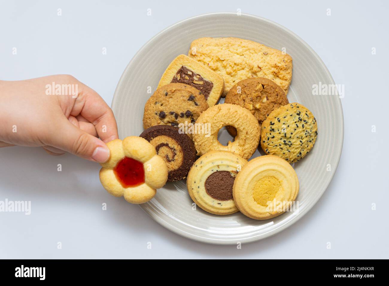 Different types of sweet cookies in bowls Stock Photo - Alamy