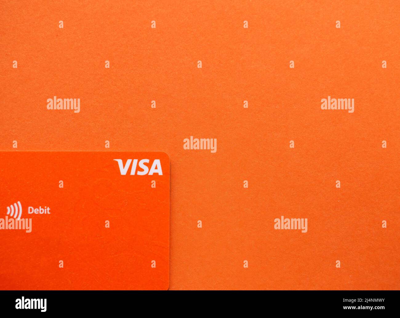 Bucharest, Romania - 03.25.2022: Orange Visa credit or debit card on ...