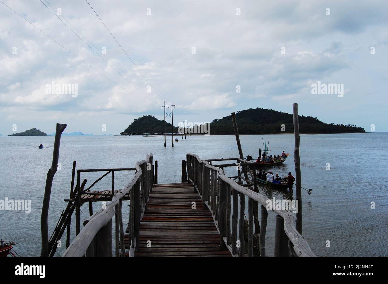 View landscape wooden bridge and boat pier go to Koh Pitak or Ko ...
