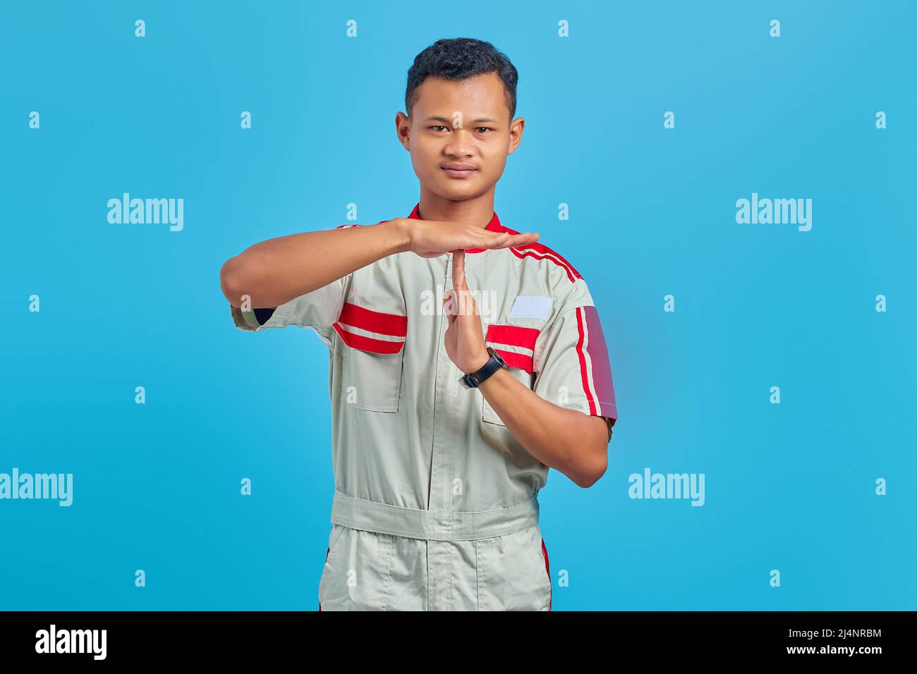 Portrait employee showing timeout gesture hi-res stock photography and ...