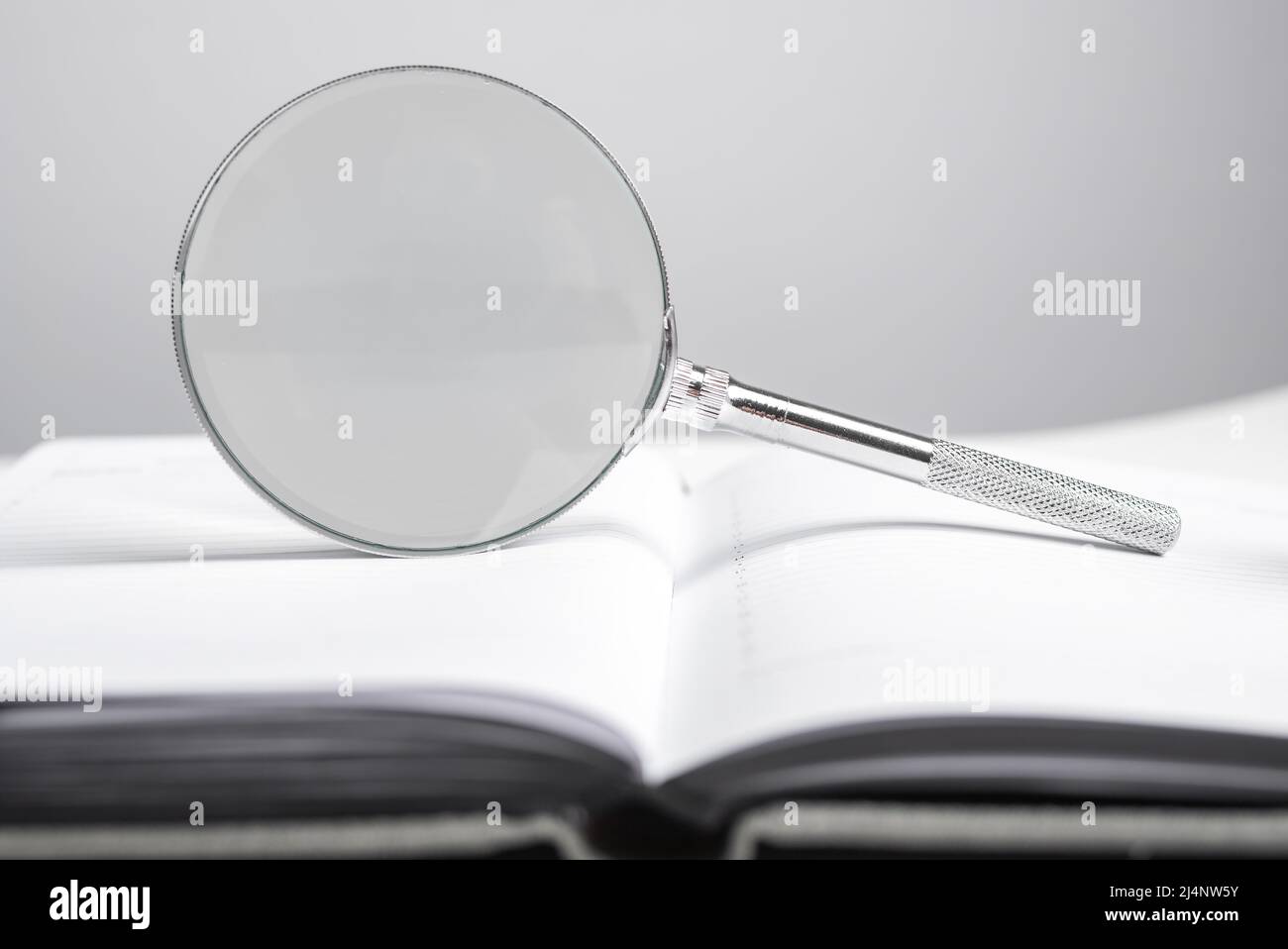 Magnifying calendar hi-res stock photography and images - Alamy