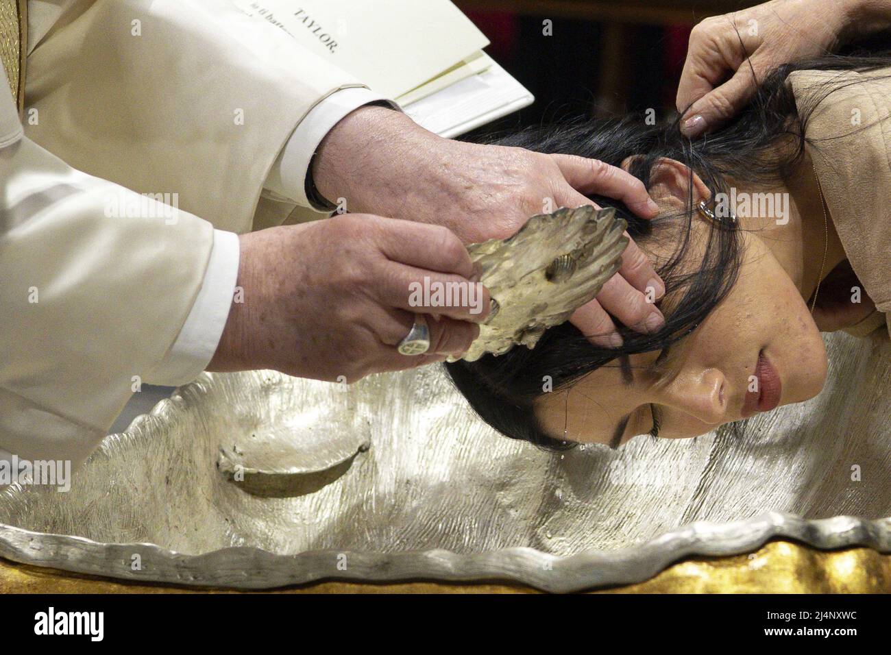 Pope Francis baptized seven catechumens during the celebration of the ...