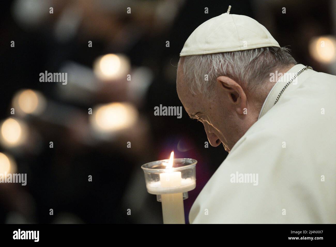 Pope Francis holds the Pascal Candle during the celebration of the ...