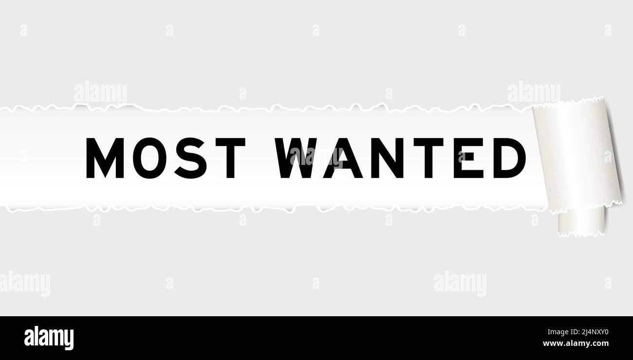 Ripped gray paper background that have word most wanted under torn part ...