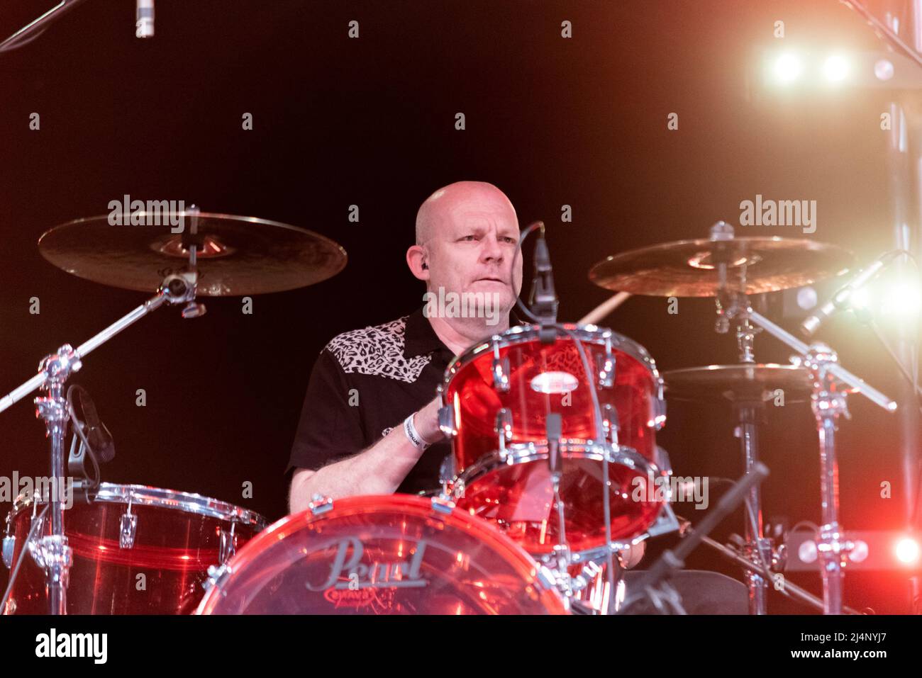 Drummer Adrian Hill of Doctor and the Medics band performing at a ...
