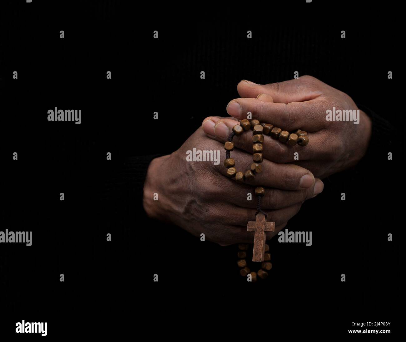 Praying god hands together bible hi-res stock photography and images ...