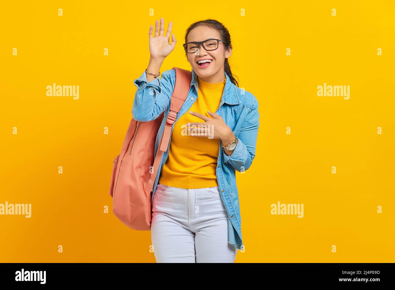 Excited young college student waving hi-res stock photography and ...