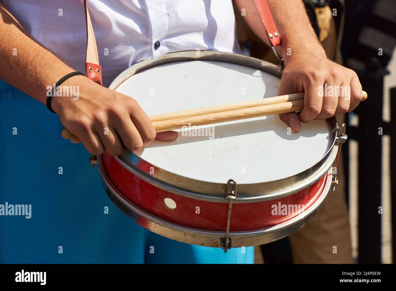 An old Soviet drum hangs around the neck of a pioneer Stock Photo - Alamy