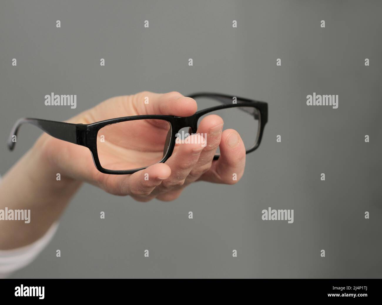 glasses on display at an optician shop white background stock image ...