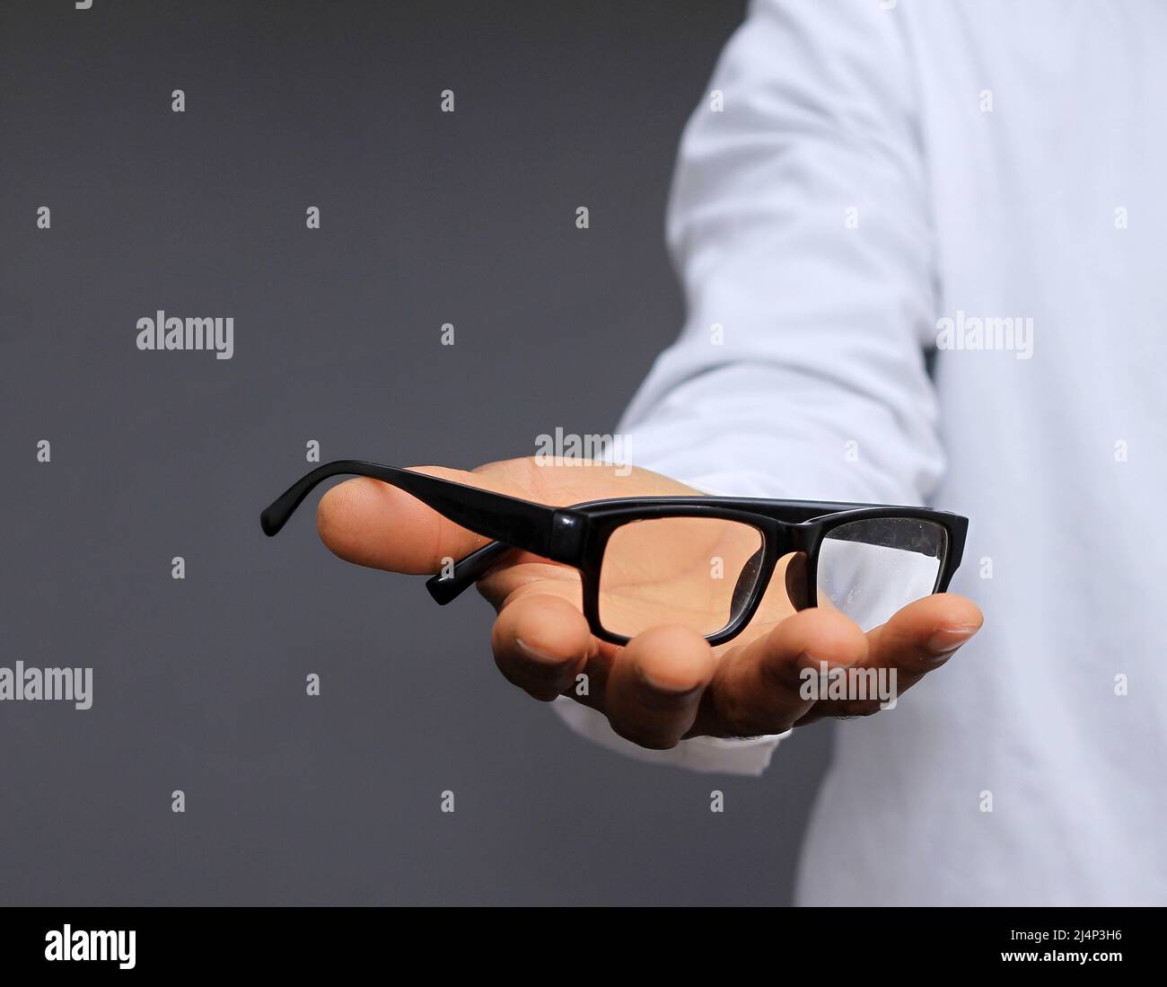 glasses on display at an optician shop white background stock image ...