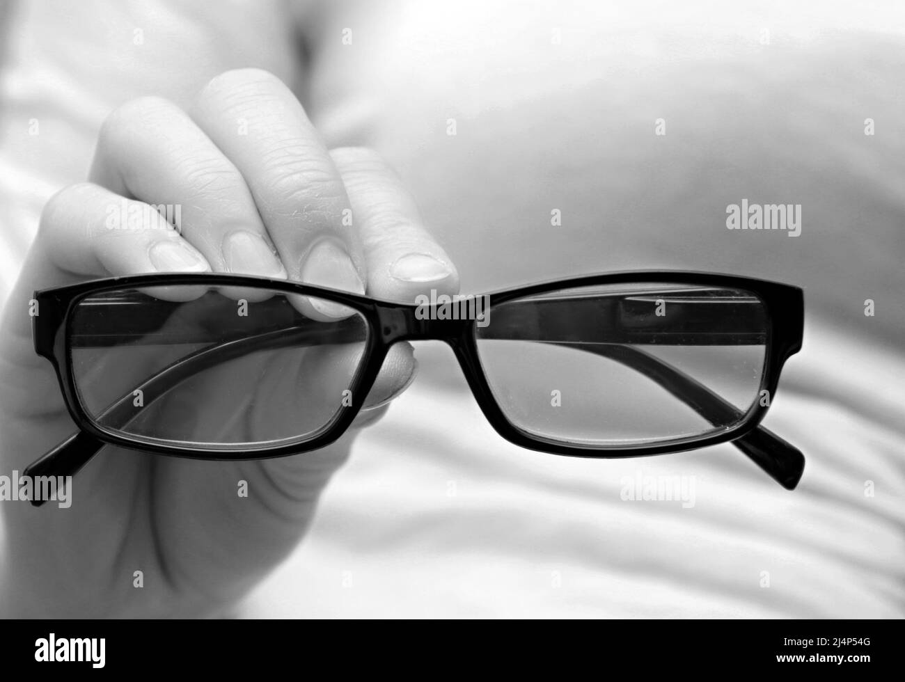 glasses on display at an optician shop white background stock image ...