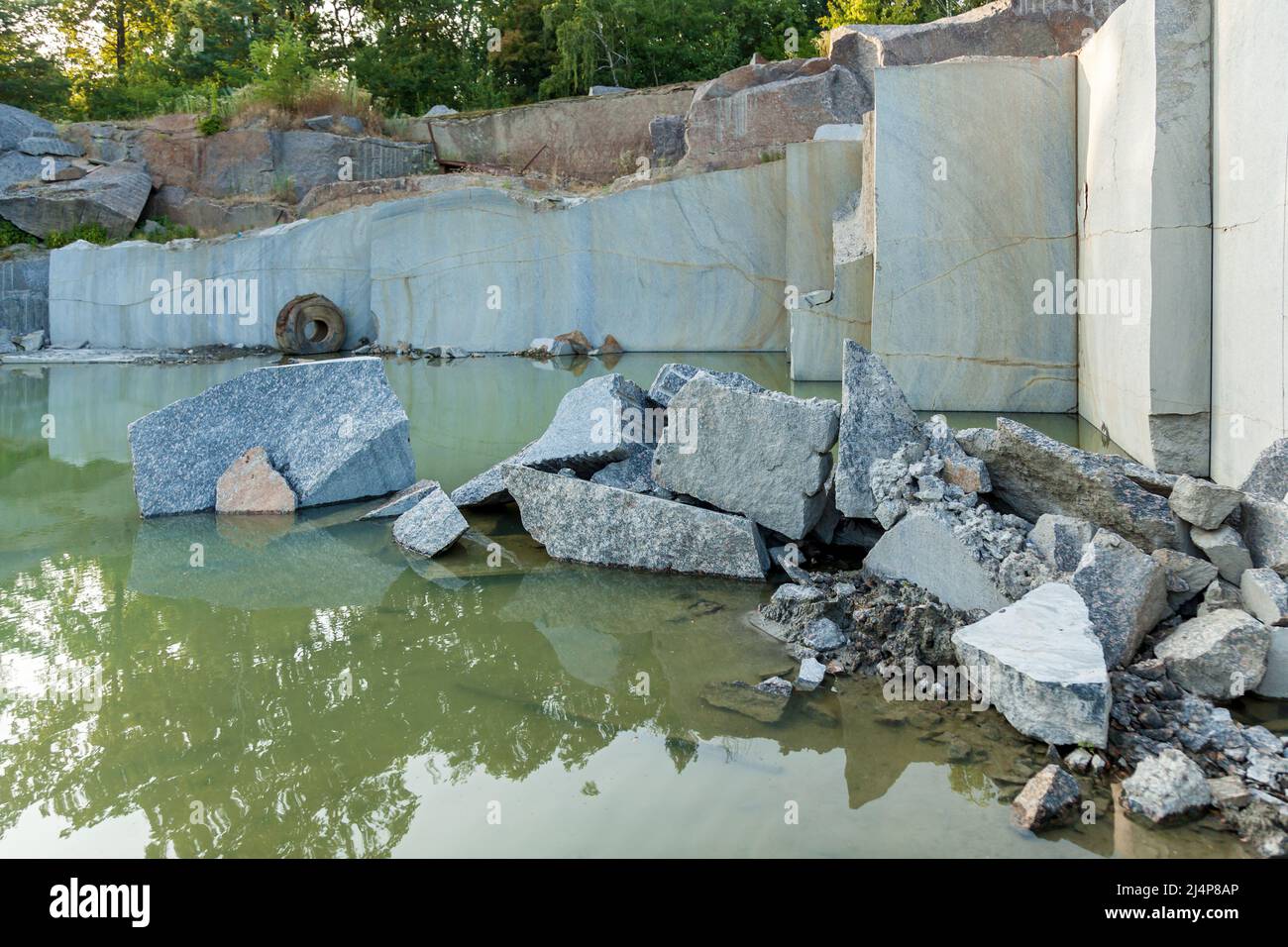 Granite quarry with large granite blocks Abandoned granite quarry with ...