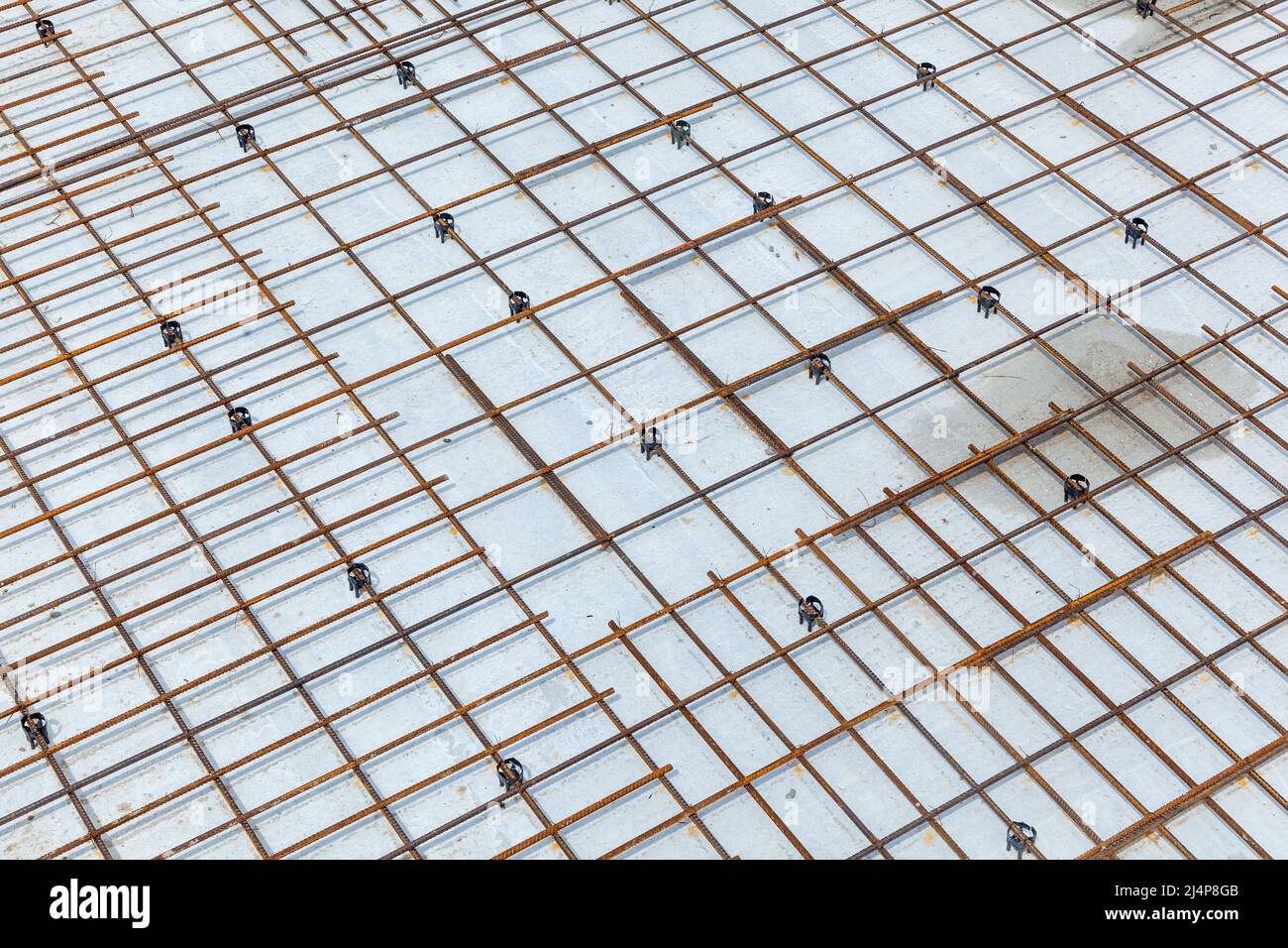Rebar metal frame. Steel mesh interconnected at the construction site ...