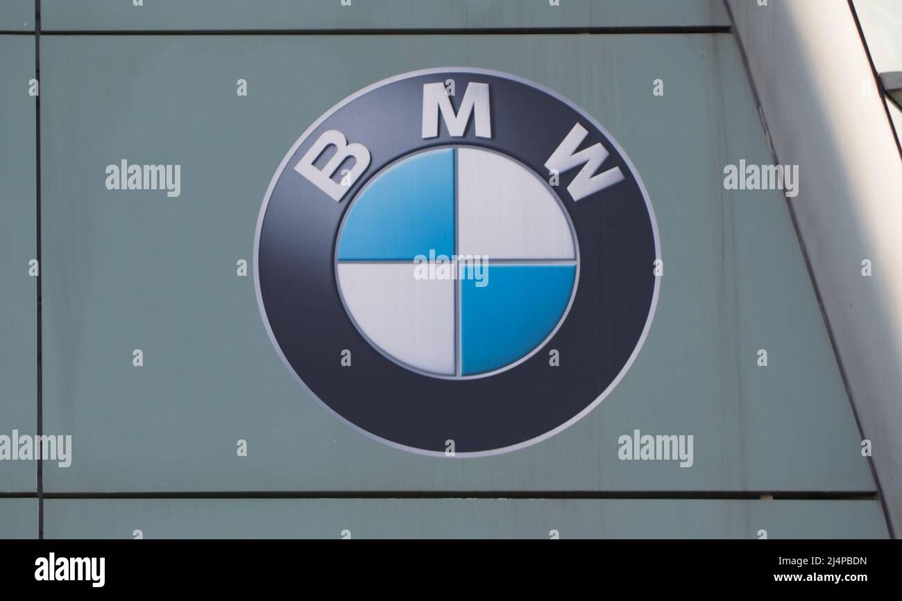 BERLIN, GERMANY - CIRCA FEBRUARY 2022: BMW car dealer storefront sign ...