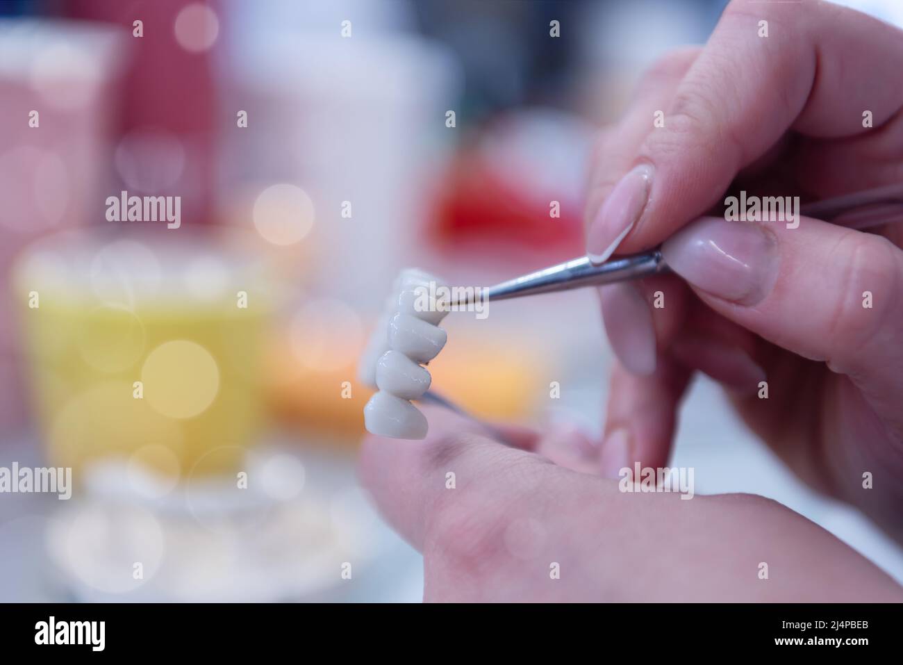 Dental prosthesis, dentures, prosthetics work. A study and a table with ...