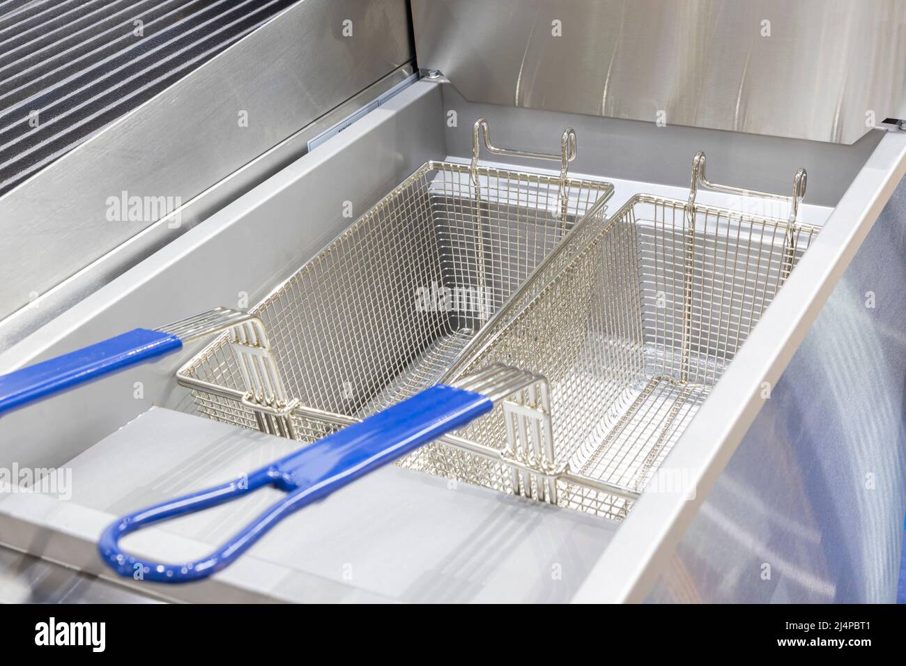 New empty modern professional deep fryer basket for kitchen restaurant ...