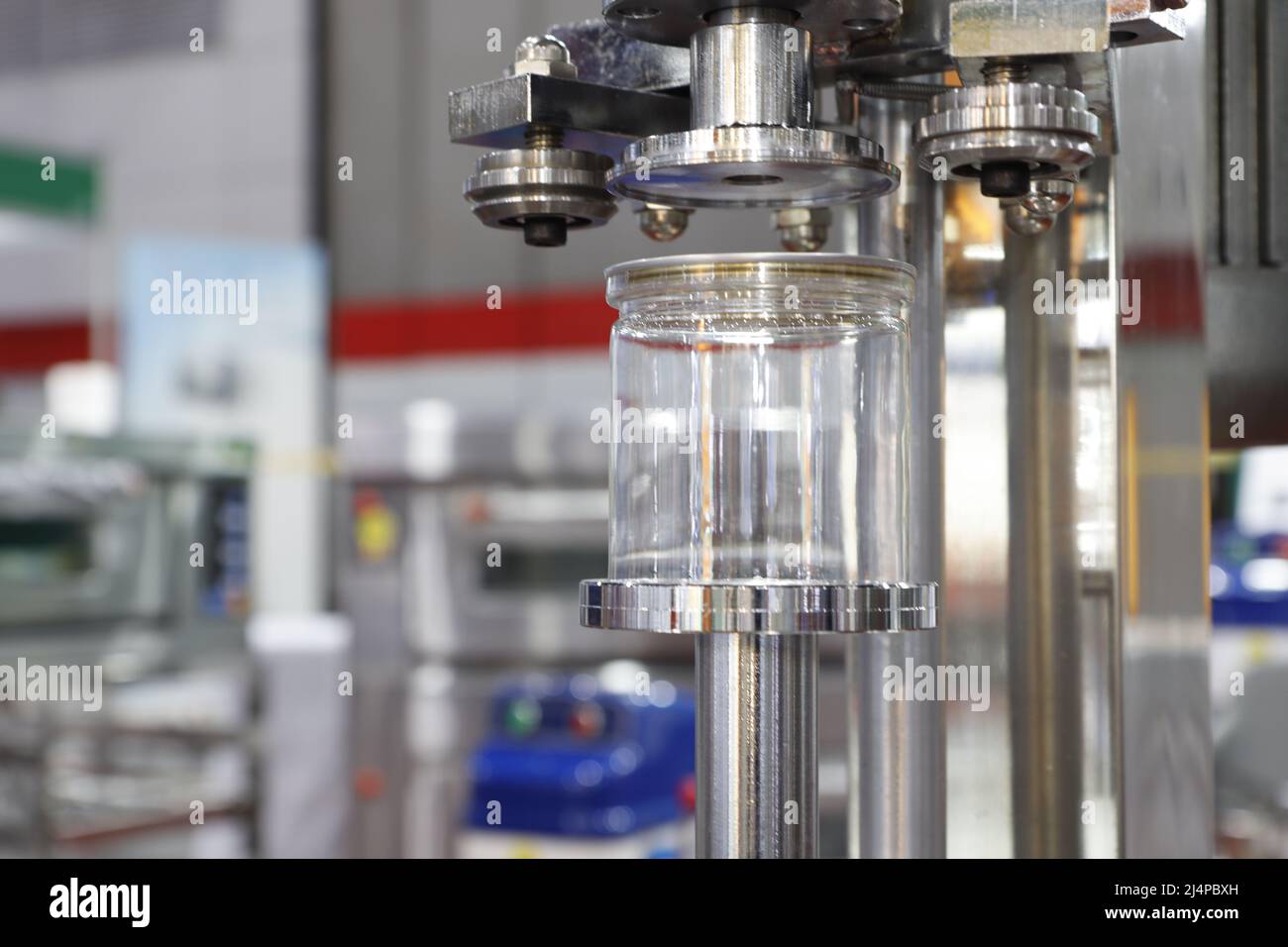 Aluminum lid packing machine for plastic can ; food industry Stock ...