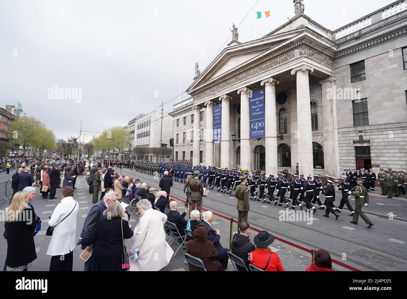 Branches of the Defence Forces march past during a ceremony to mark the ...