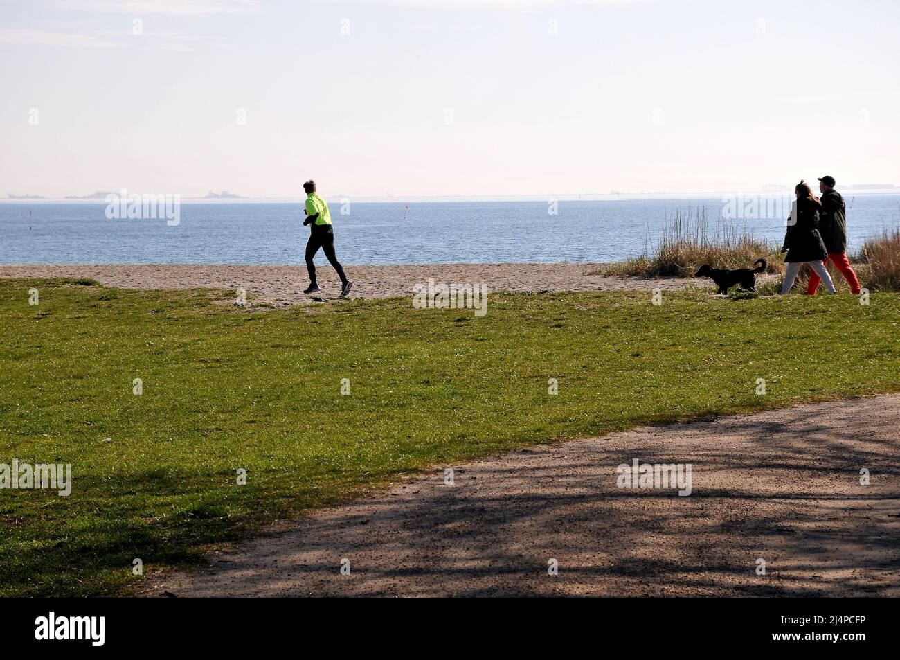 Kastrup/Copenhagen/Denmark/17 April 2022/ People walking and wind ...