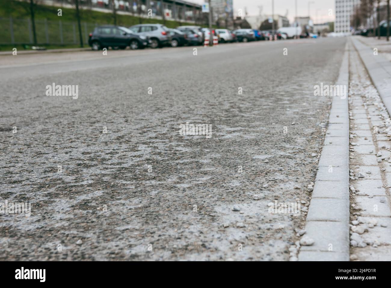 Asphalt pavement of the highway. The coating is not new, gradually ...