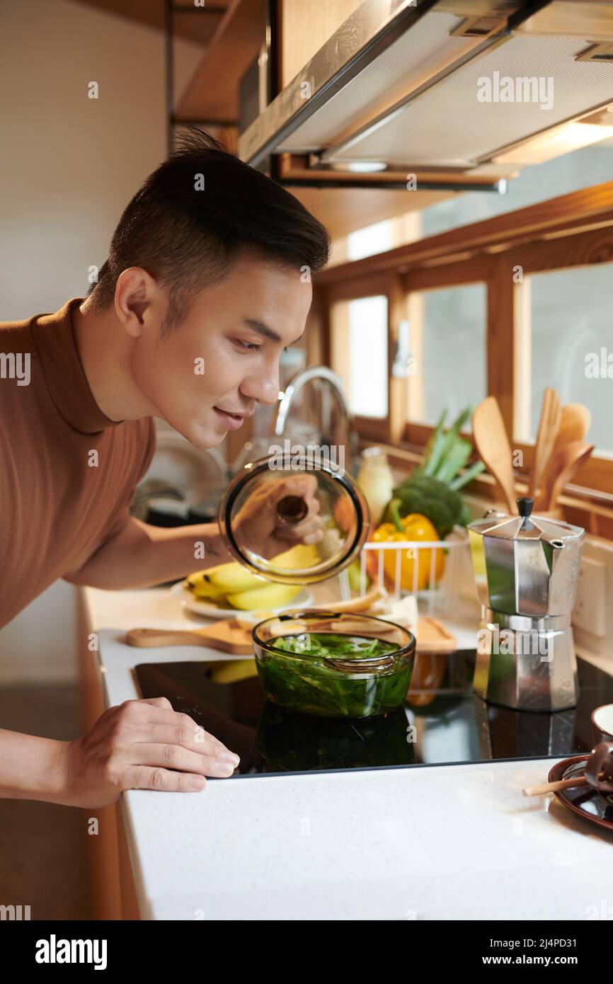 Man cooking soup in hi-res stock photography and images - Alamy