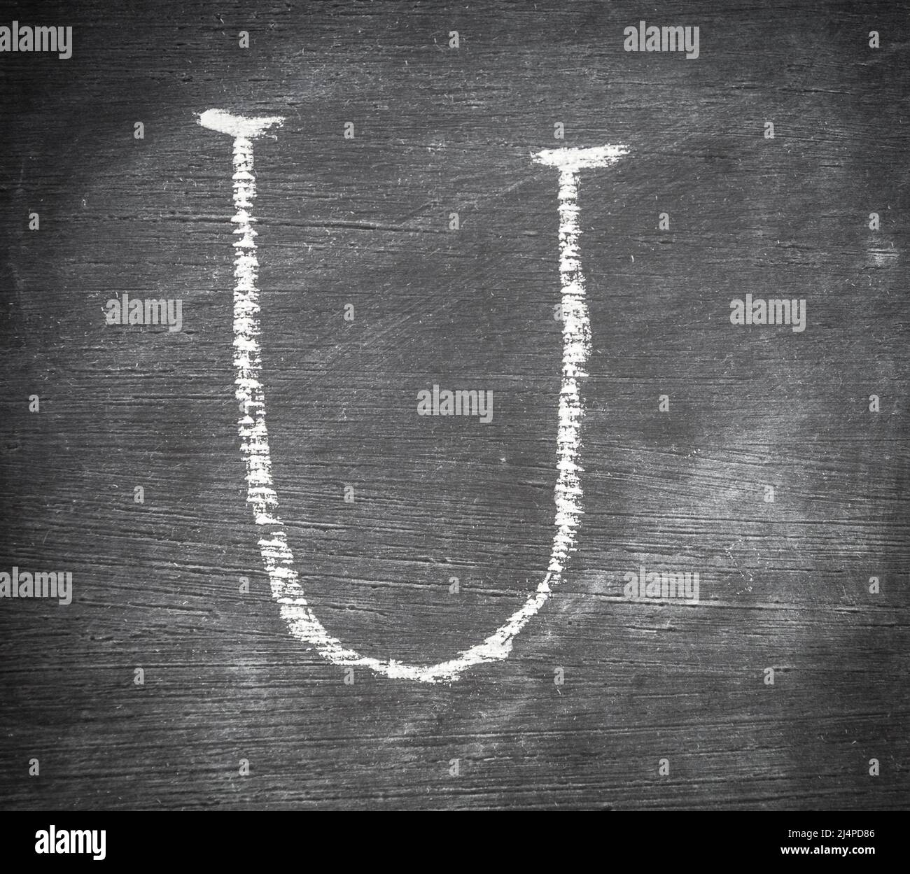 U - letter written on black chalkboard Stock Photo - Alamy