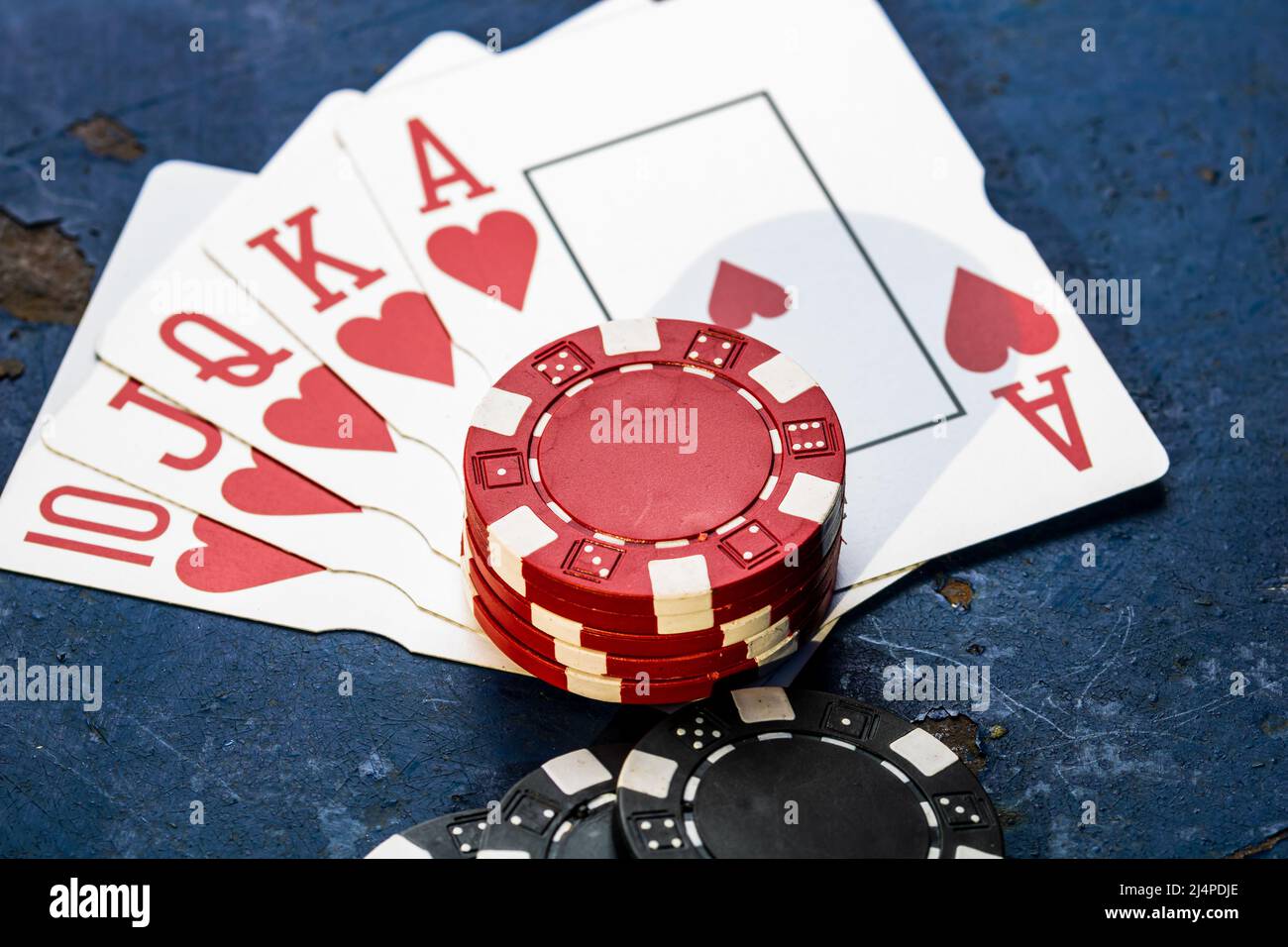 Stacks of poker chips with money and cards Stock Photo - Alamy