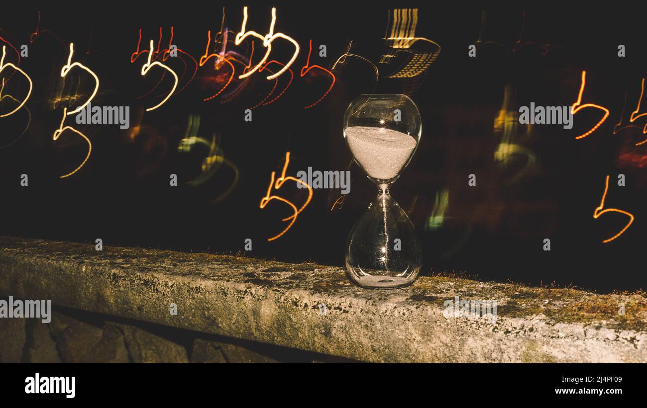 hourglass at night Stock Photo - Alamy
