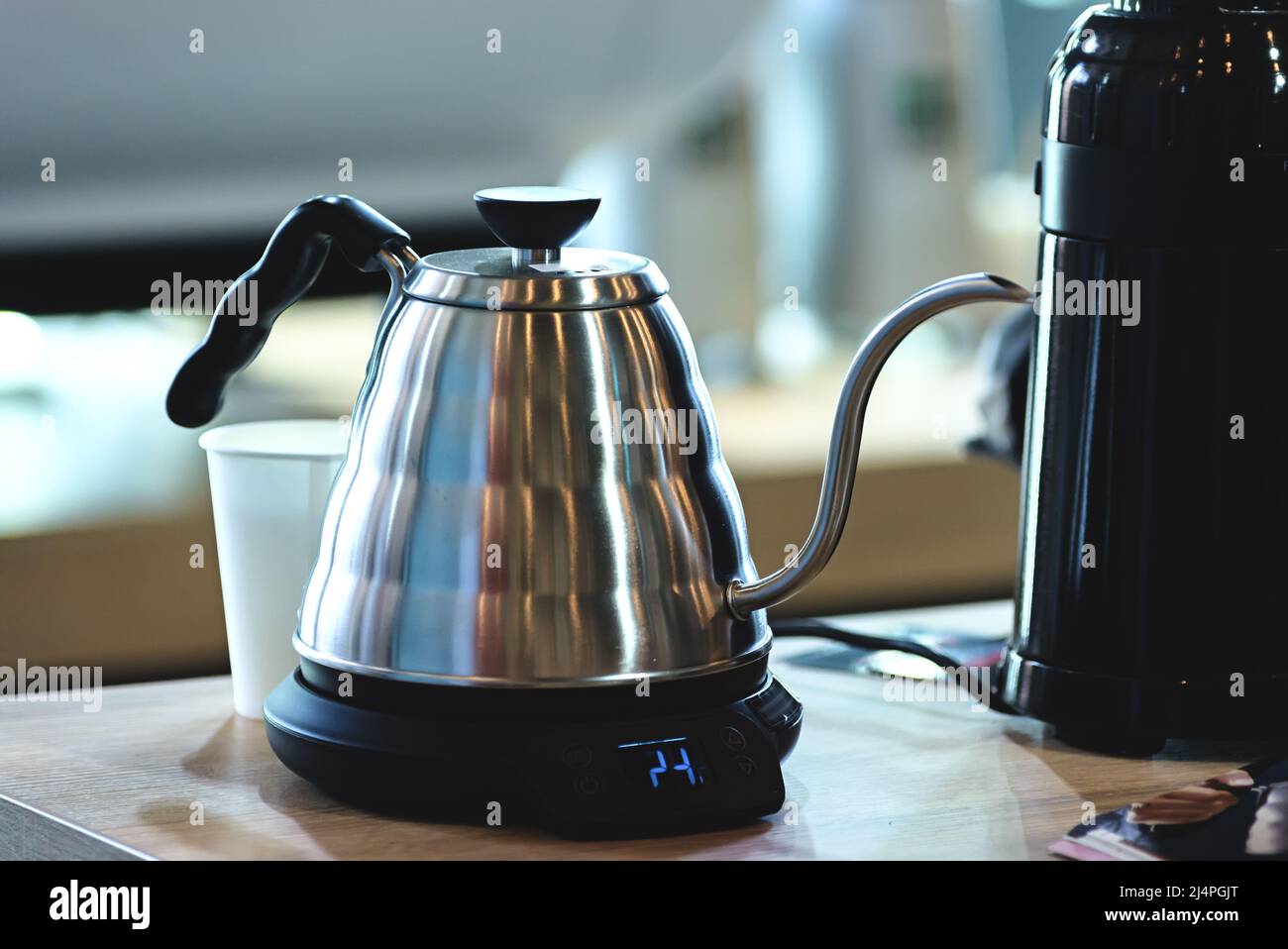 Electric kettle for brewing coffee with a long spout Stock Photo - Alamy